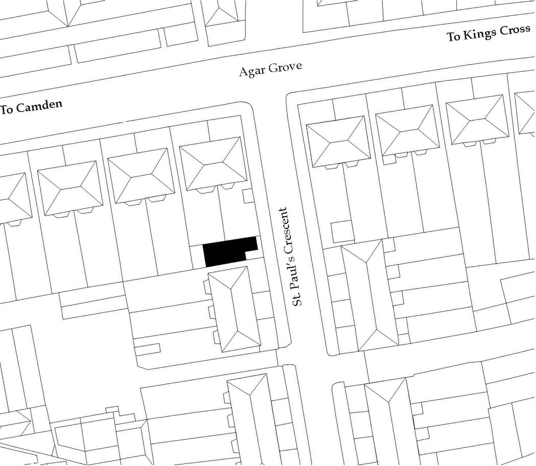 A Fascinating Home with Black Engineering Bricks and Slabs of White ...