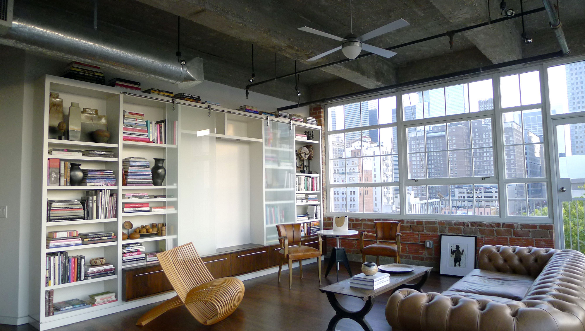 A Stylish Contemporary Loft with Exposed Brick and Concrete Ceilings in ...