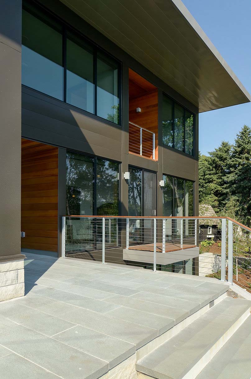 A Stunning Glass Lake House with Modern Silhouette of Earthy Materials ...