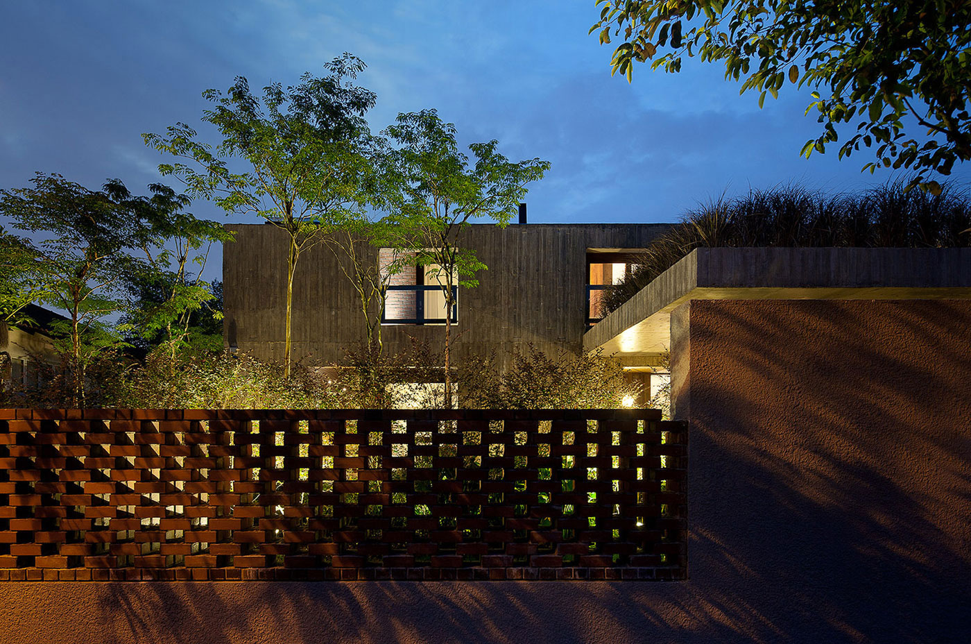 A Stunning Modern Bungalow with Red Brick and Concrete Structure in ...