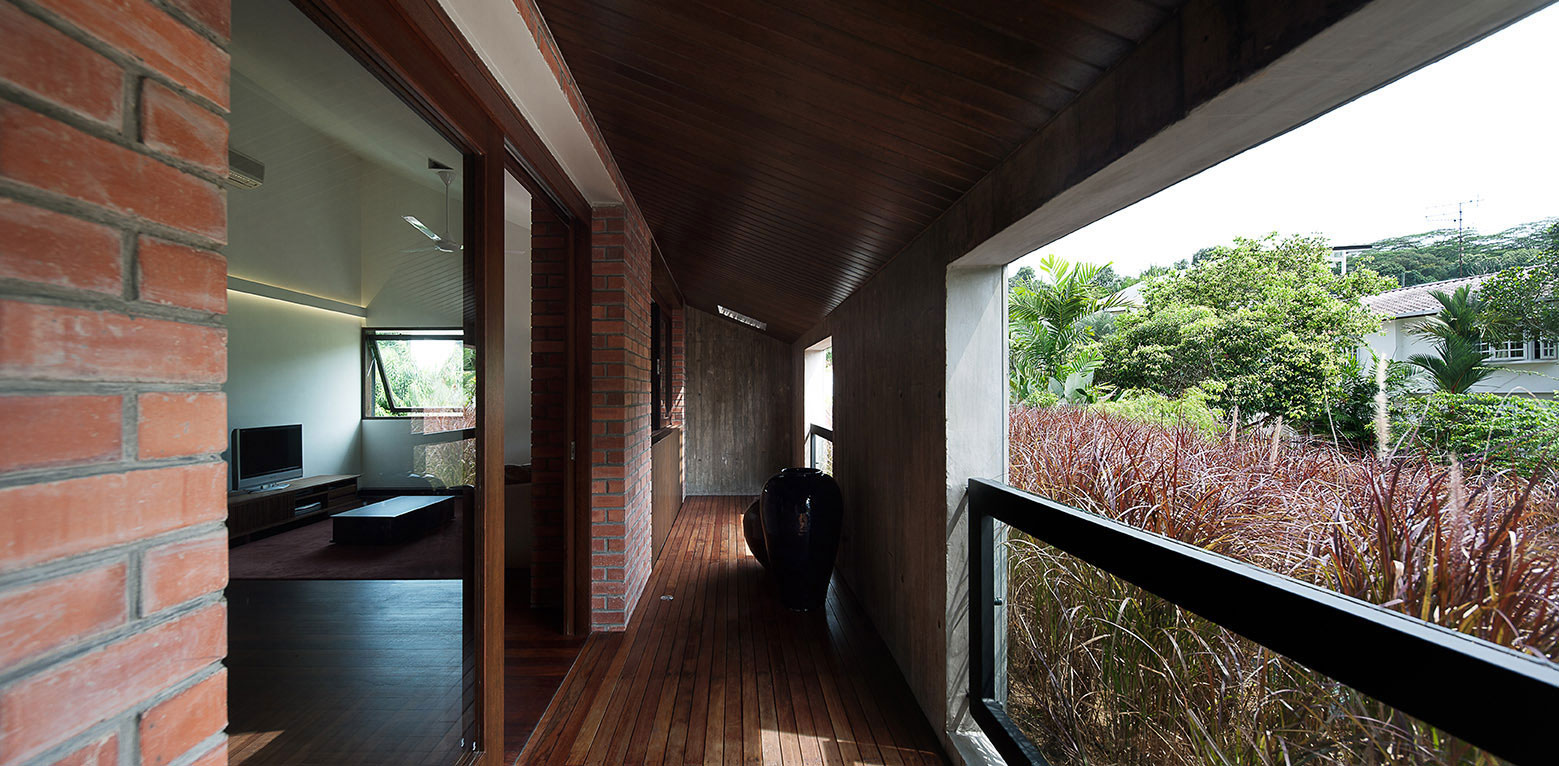 A Stunning Modern Bungalow with Red Brick and Concrete Structure in ...