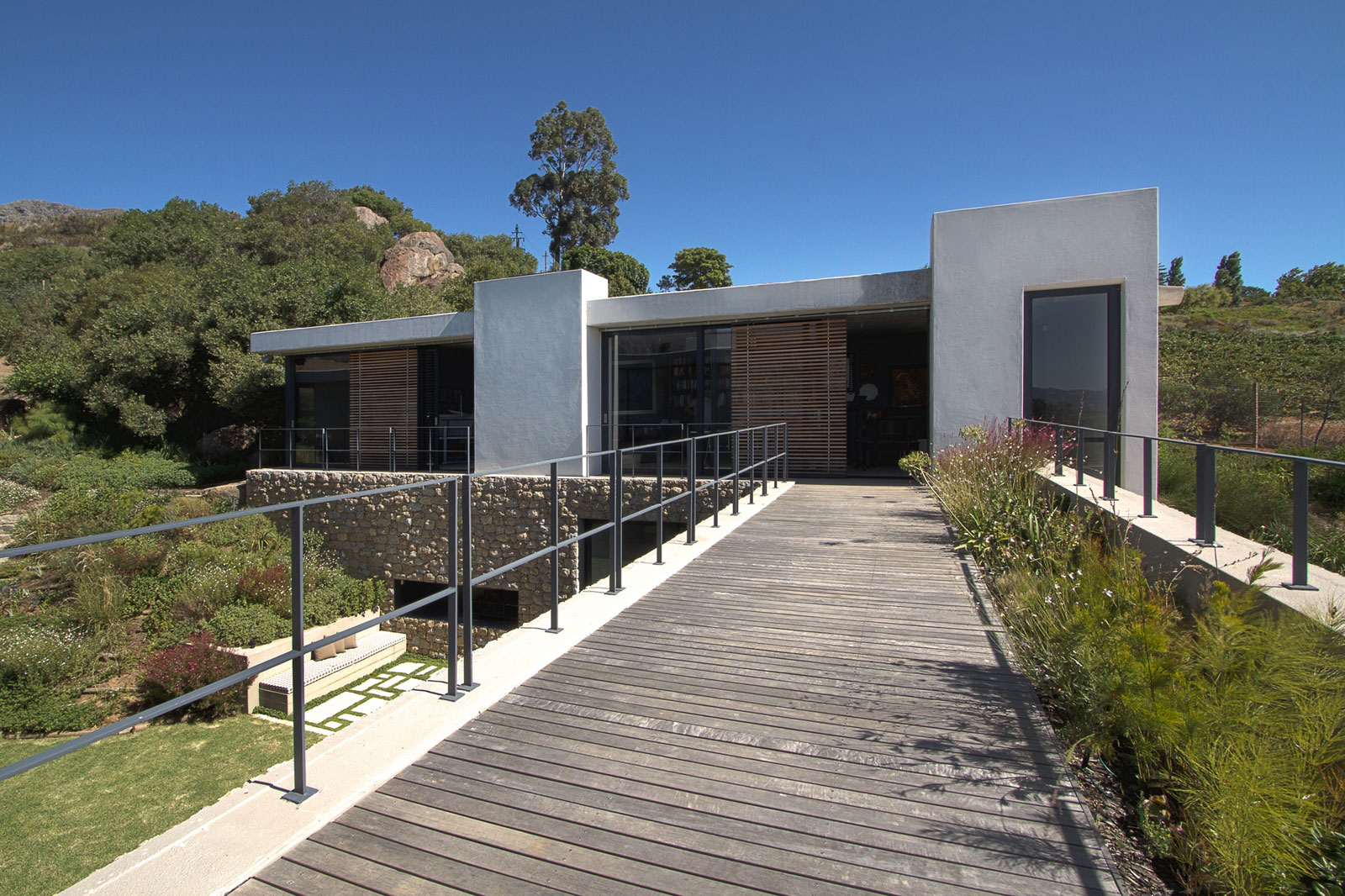 A Stunning Modern Hillside Home Nestled in the Rolling Vineyards of ...