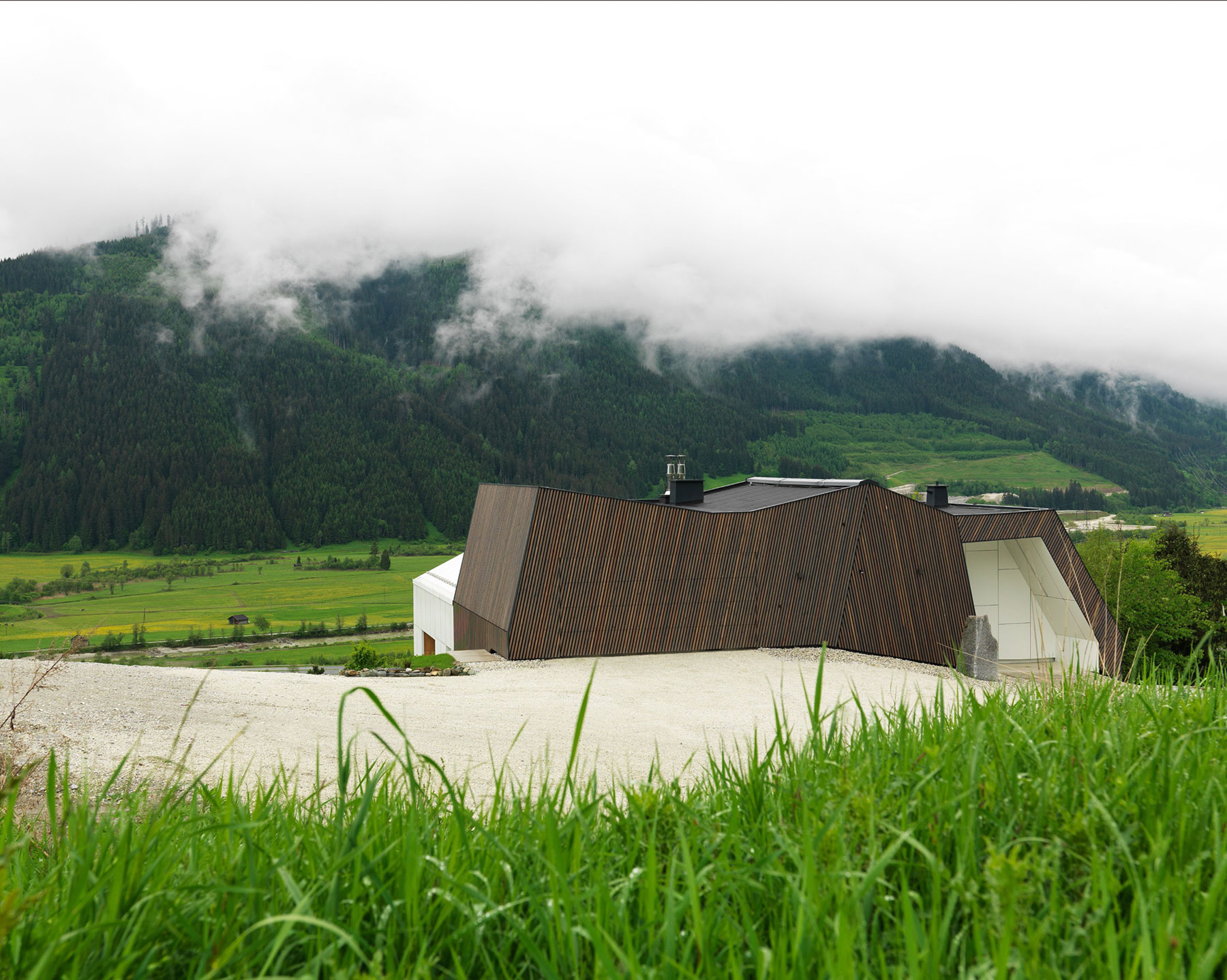 A Stunning Mountain House Nestled on the Hillside Overlooking the ...